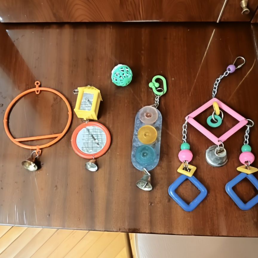 Игрушки в клетку для попугаев