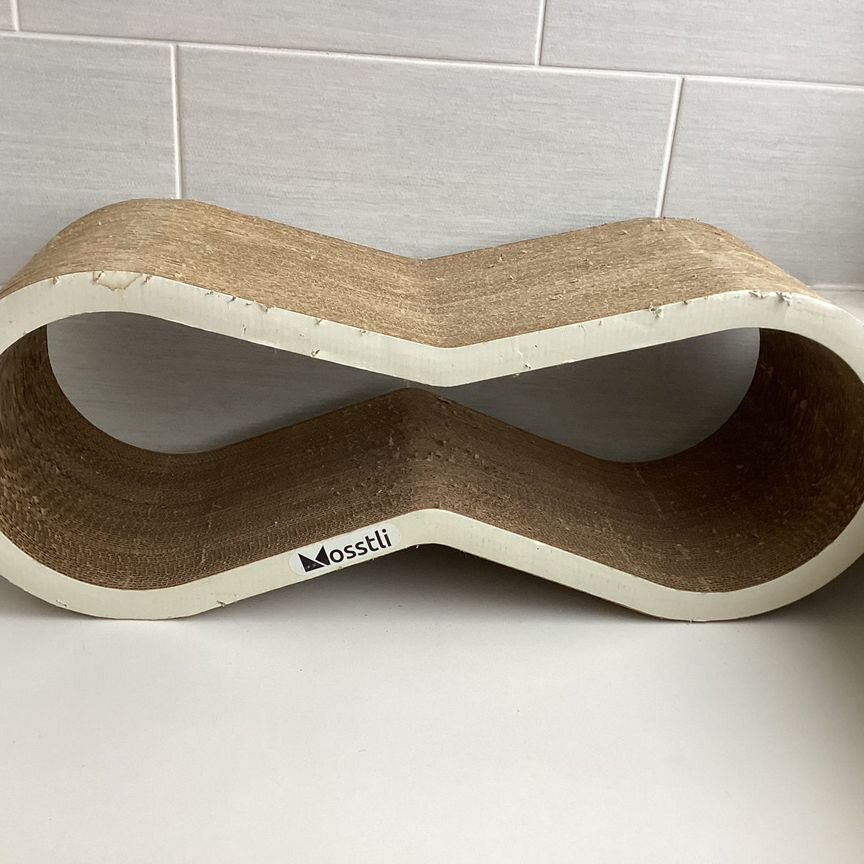 Когтеточка-лежанка из гофрированного картона